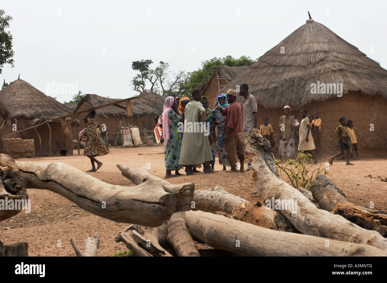 Village centre from across firewood for charcoal and cooking with ...