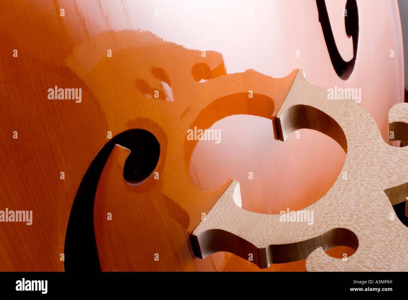 Double bass bridge and f hole Stock Photo - Alamy