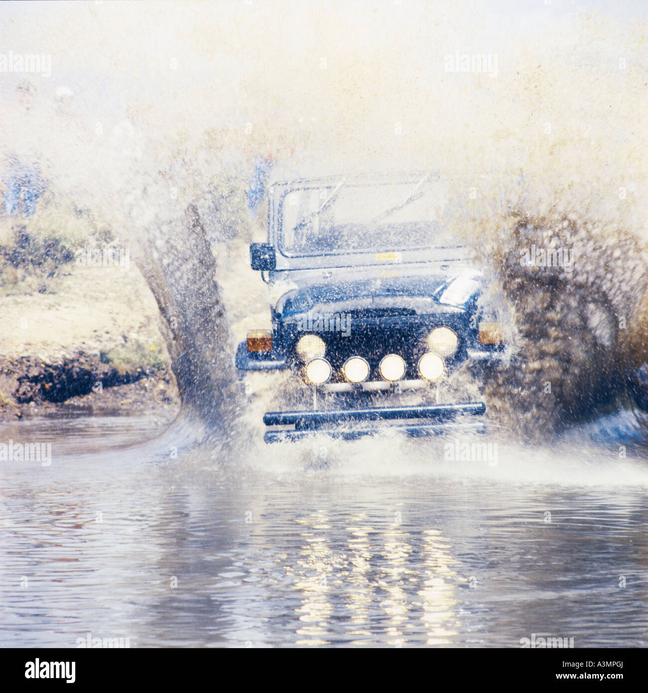 4x4 Toyota driving through a flood Stock Photo - Alamy