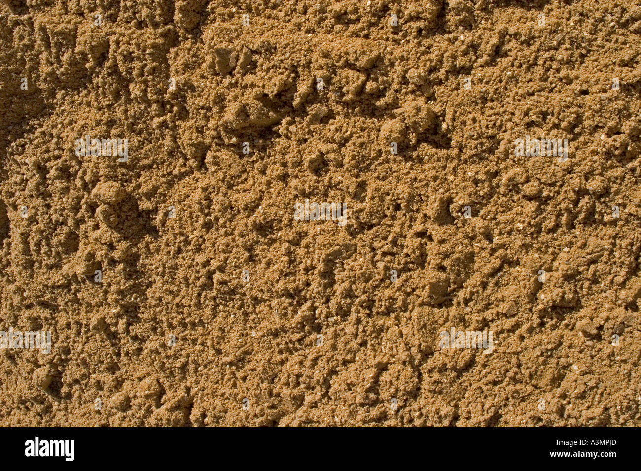 Close up of processed soft golden sand stock after quarrying from ...