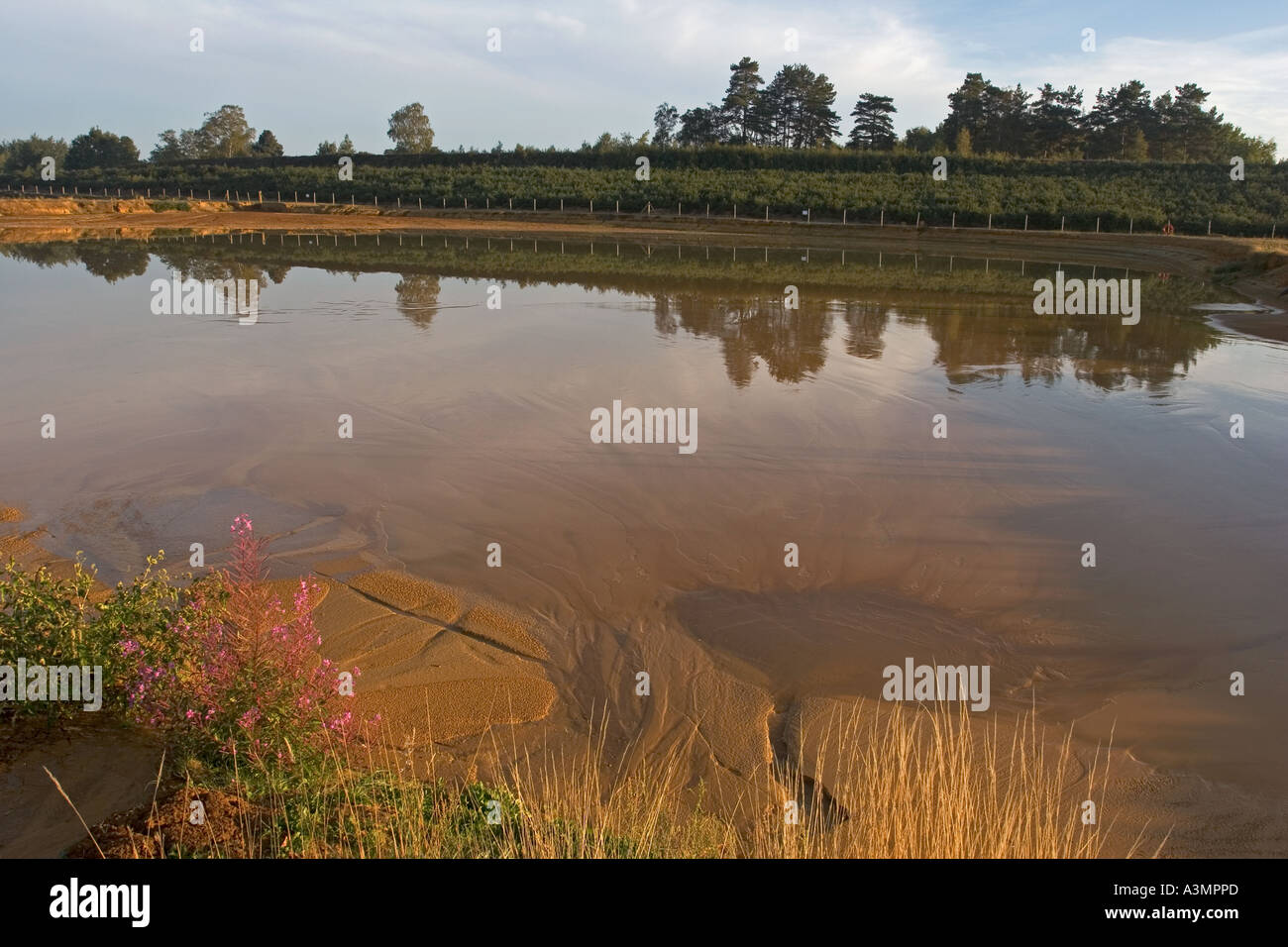 Silt settlement pond part of a gravel quarry processing plant Stock ...