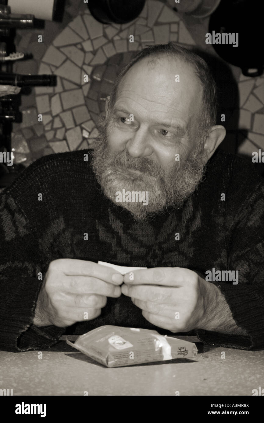 Portrait thoughtful grandfather smoking cigarette hi-res stock ...