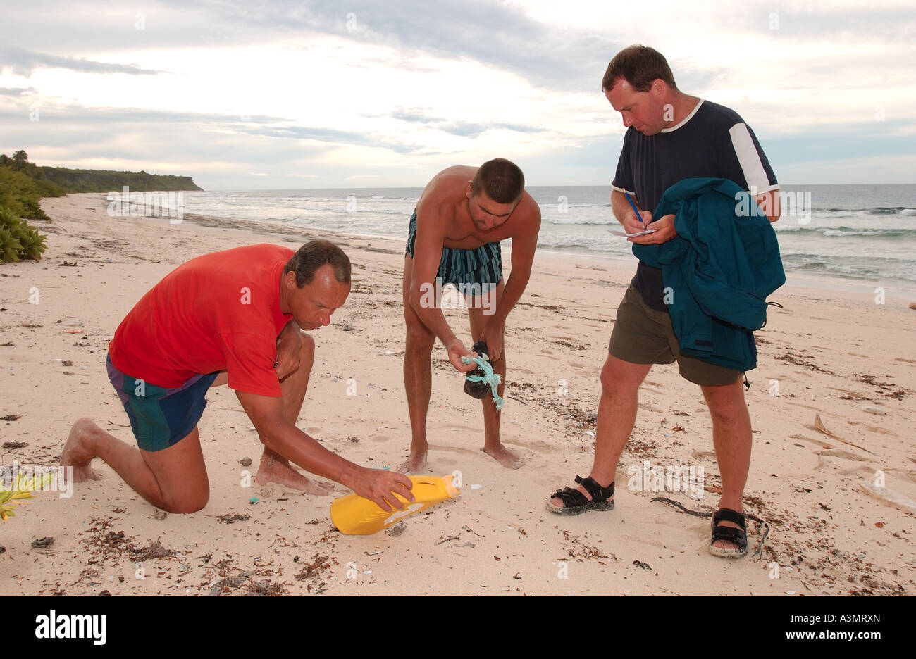 collecting litter on Henderson Island Stock Photo - Alamy