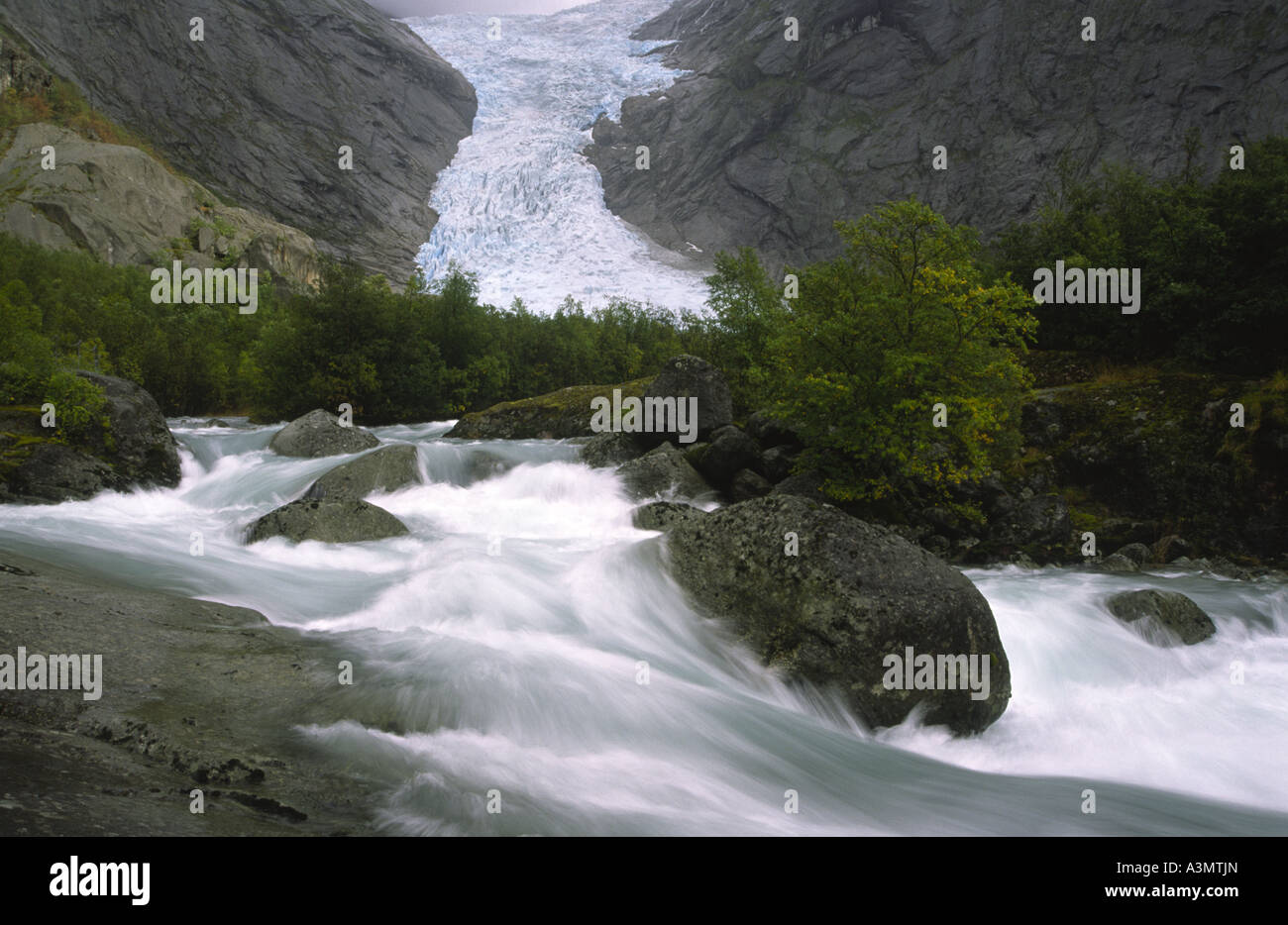 Flowing glacial meltwater stream in Norway Stock Photo - Alamy