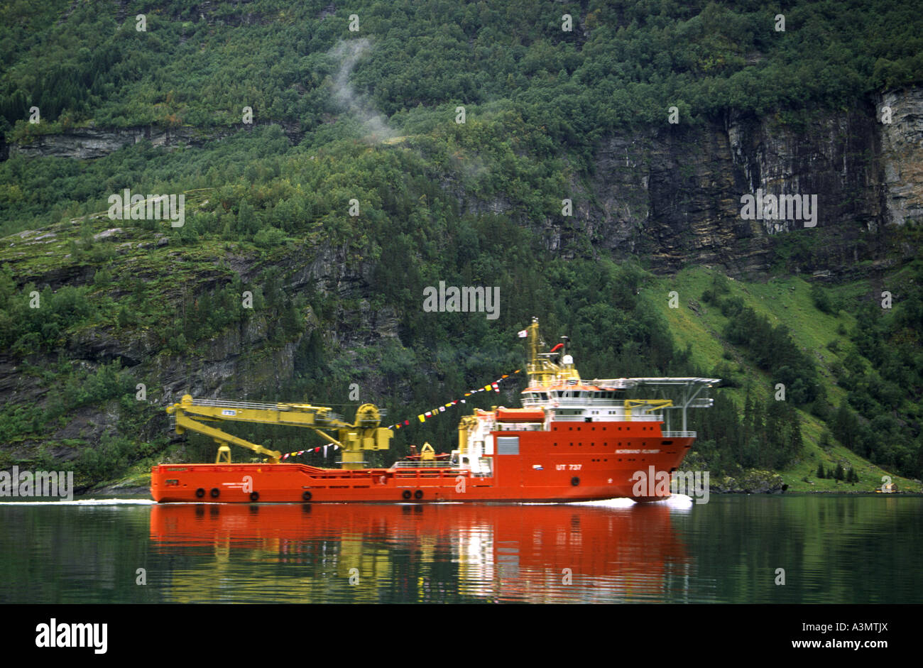 Ice breaker ship leaving fjord in Norway and heading north Stock Photo ...