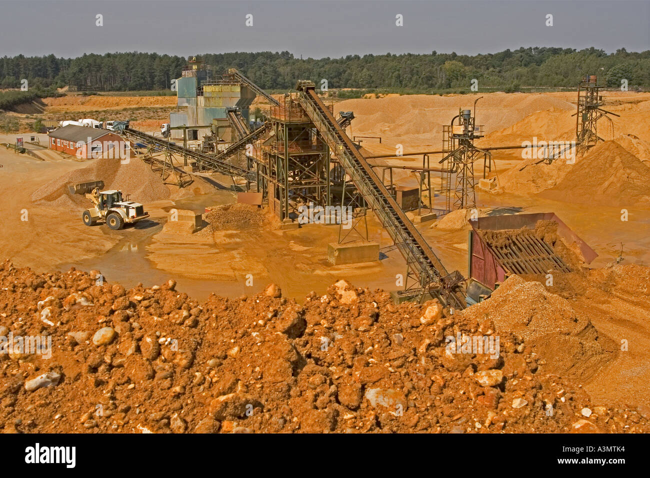Overview of quarry processing plant from top of raw stockpile Stock ...