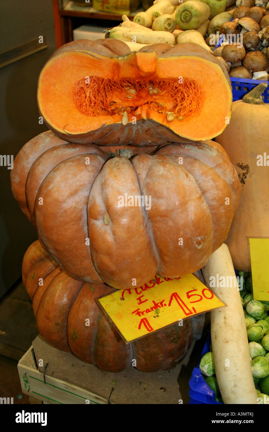 open pumpkins in market place Stock Photo - Alamy