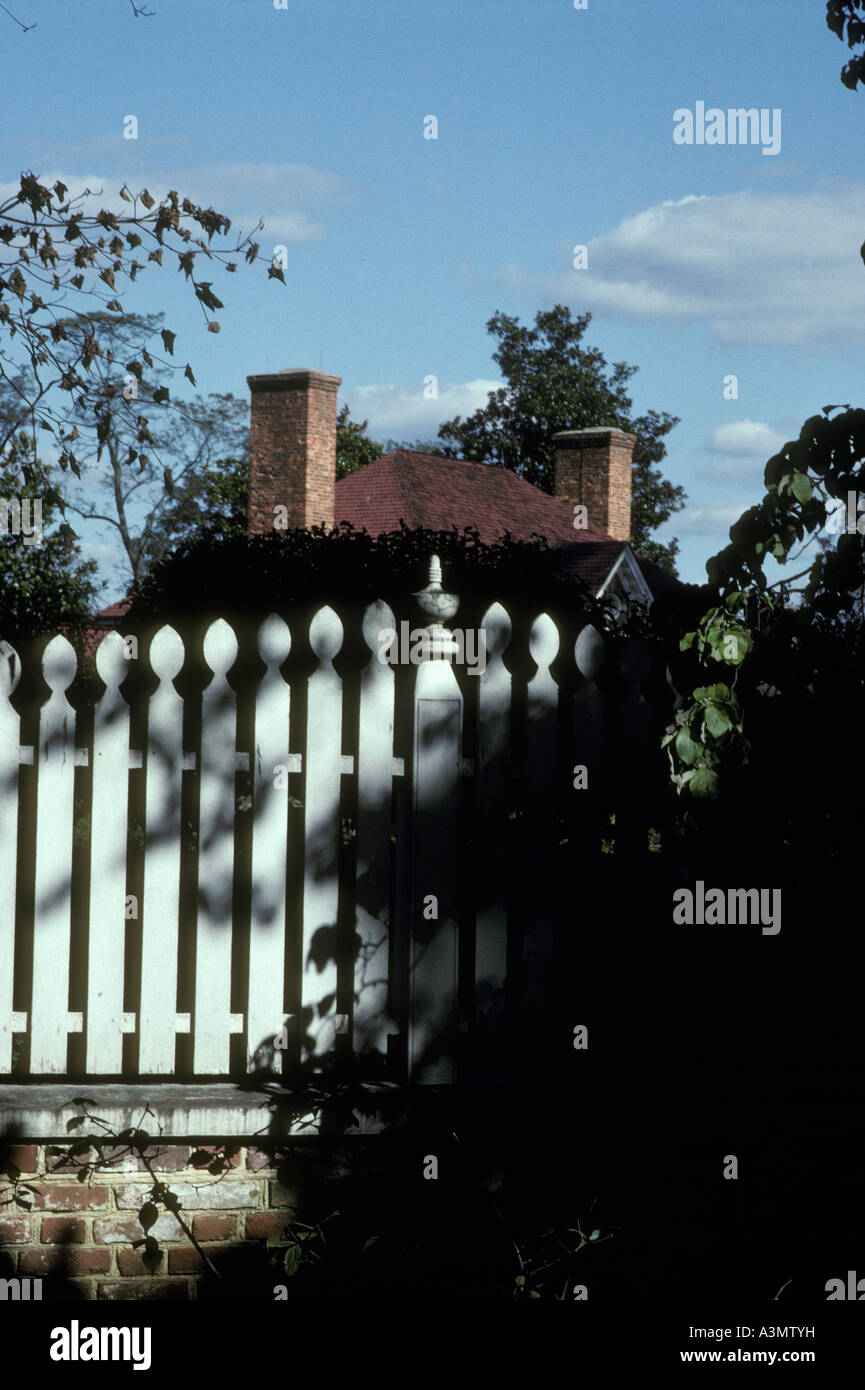 white picket fence Georgian style house chimney fireplace Stock Photo ...