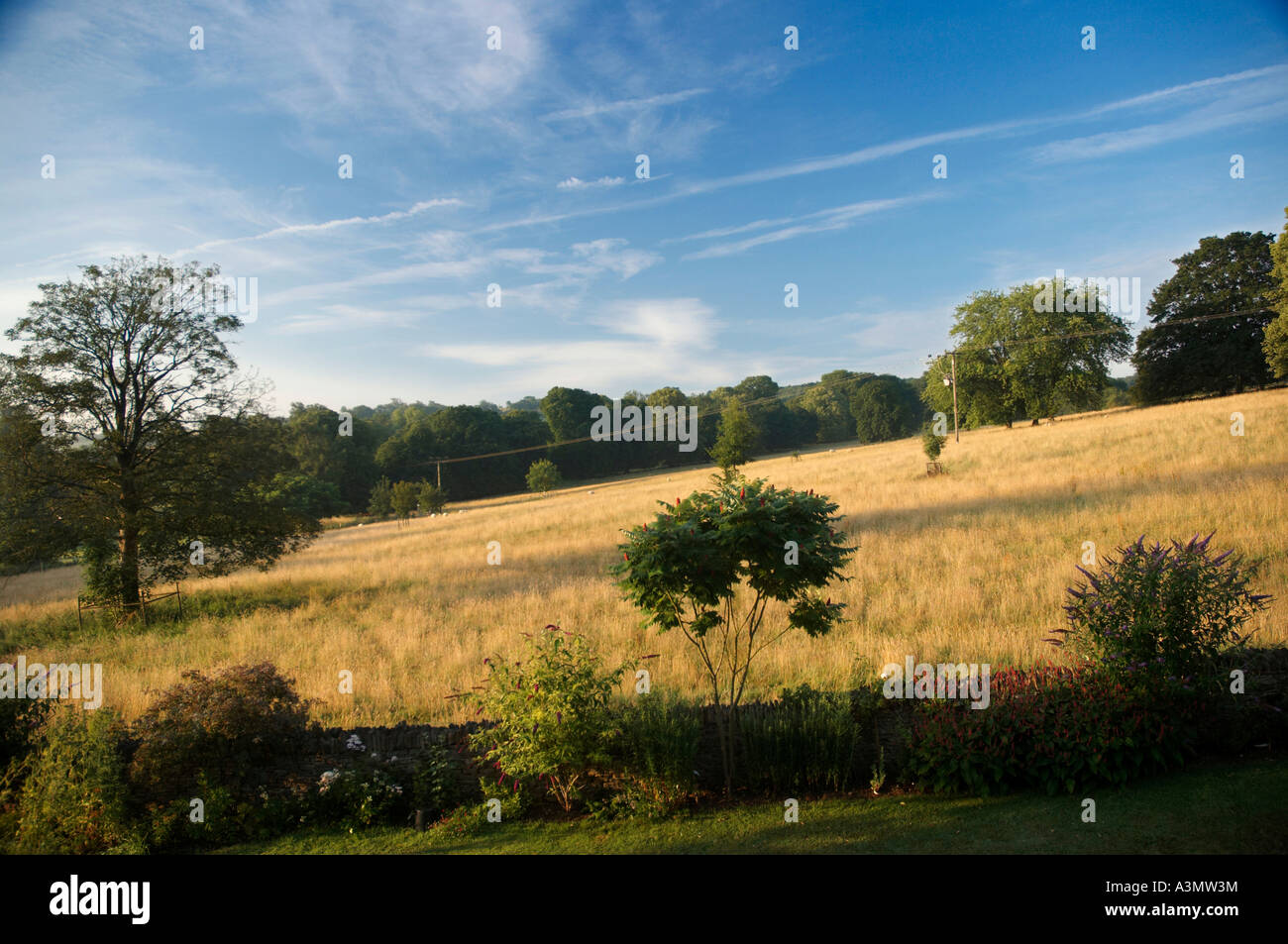 Dawn over Cowley village in the Cotswolds England Stock Photo - Alamy