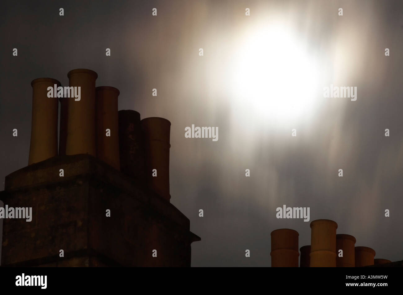 Chimney with the moon in England Stock Photo - Alamy