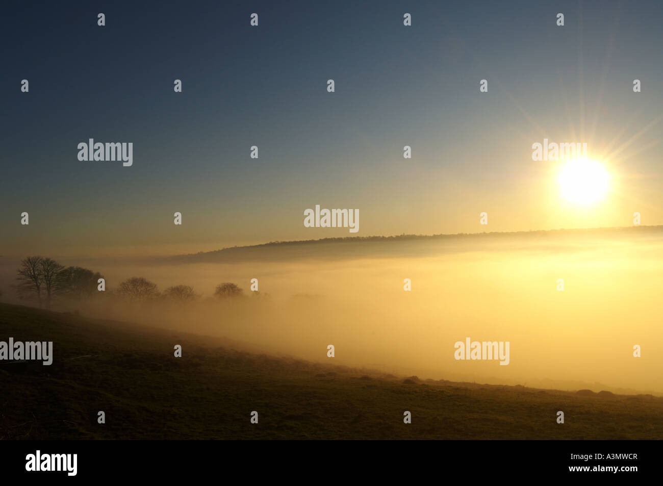 Winter sun and fog in the valley leading out of Bath in the UK Stock ...