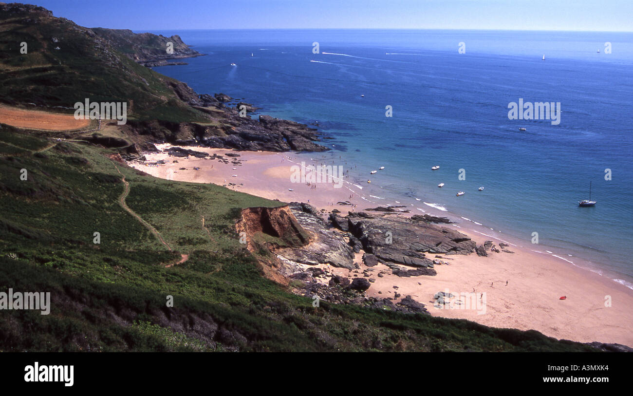 Secluded sandy beaches below Gara Rock on the South Devon coast Stock ...