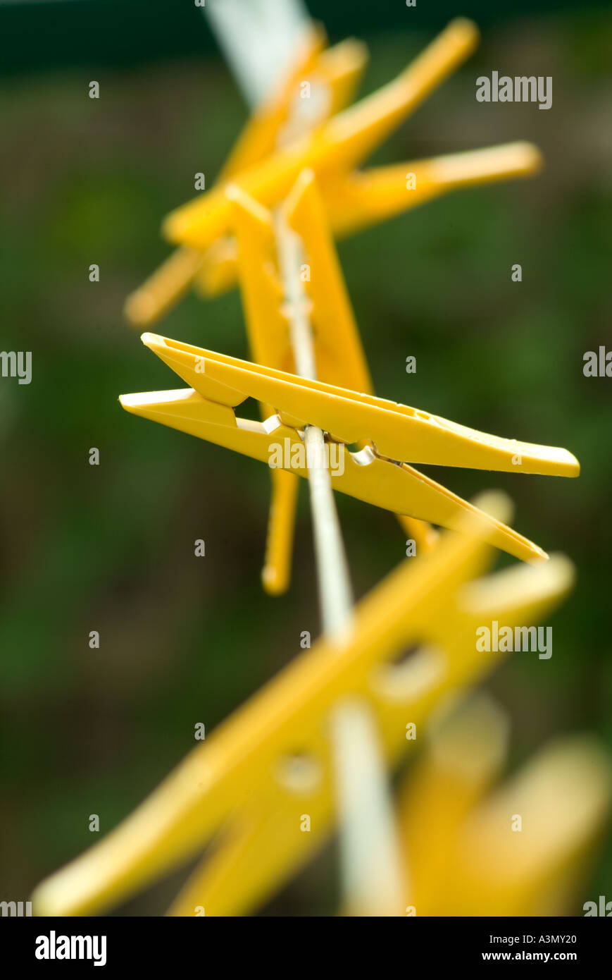 Clothes pegs on washing line Stock Photo - Alamy