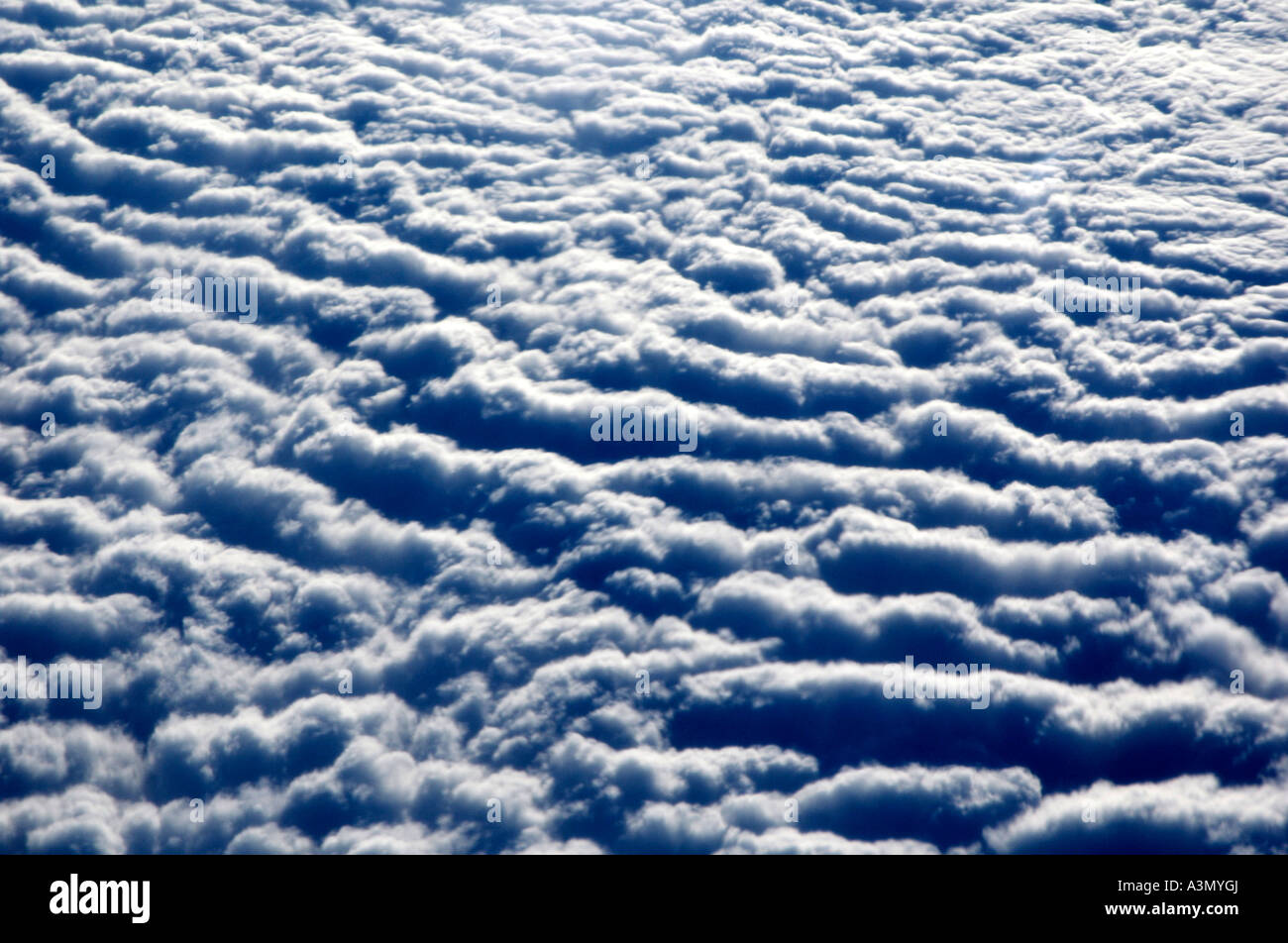 Plane flying above cloud Stock Photo - Alamy
