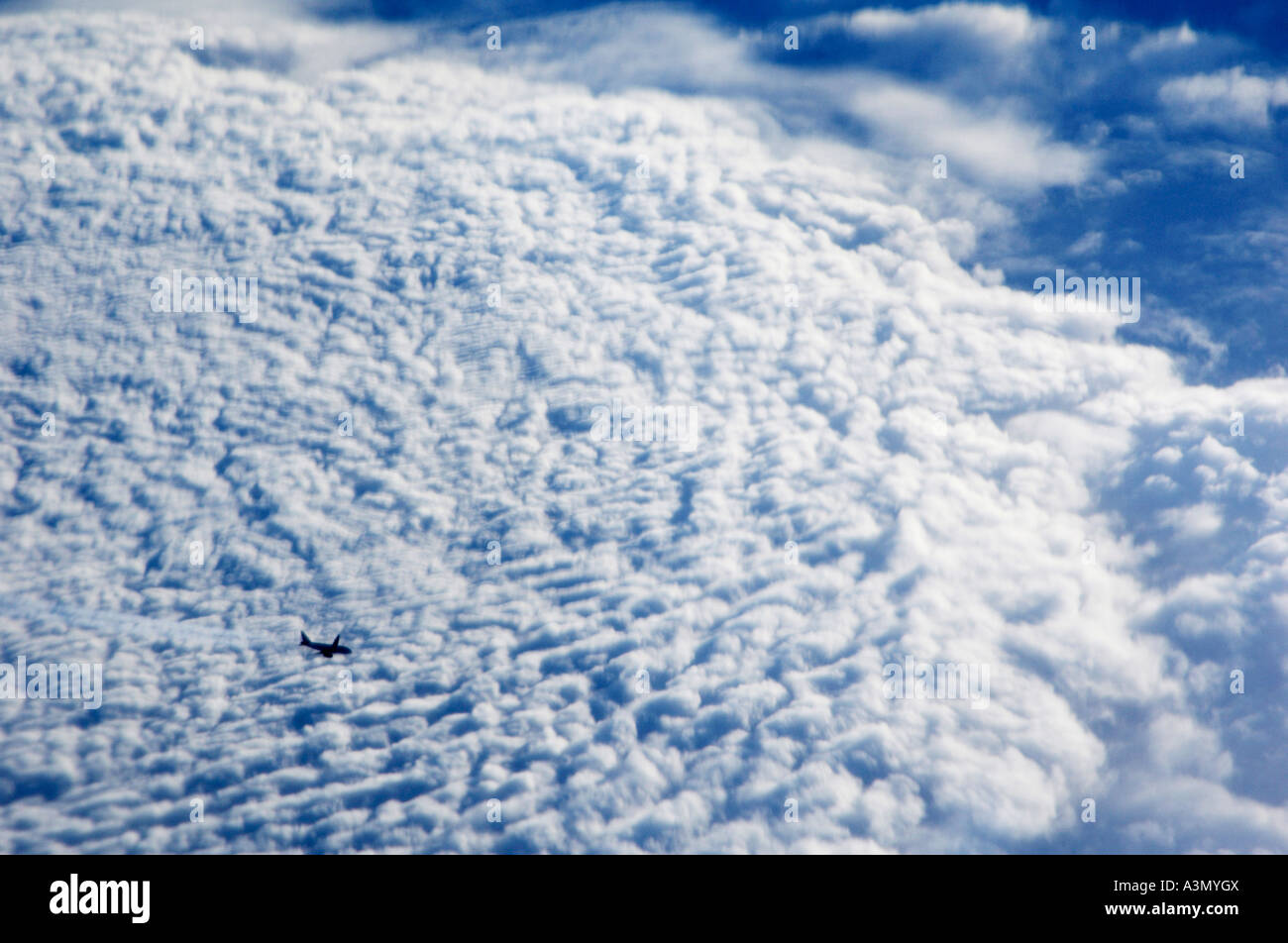 A plane flying above cloud Stock Photo - Alamy