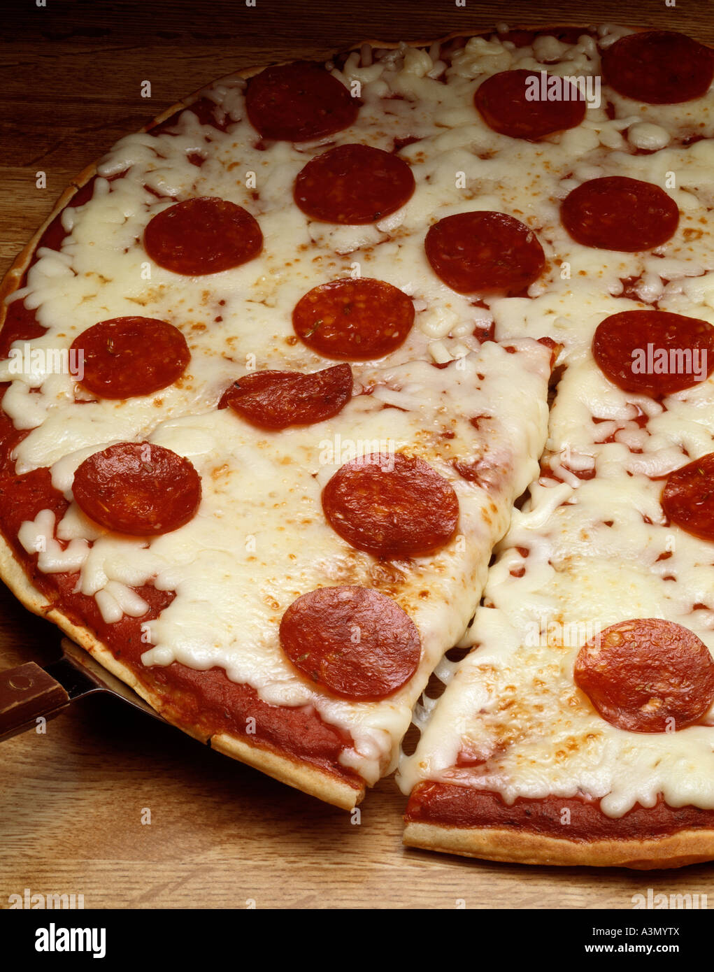 one whole Italian pizza pie cheese pepperoni Stock Photo - Alamy