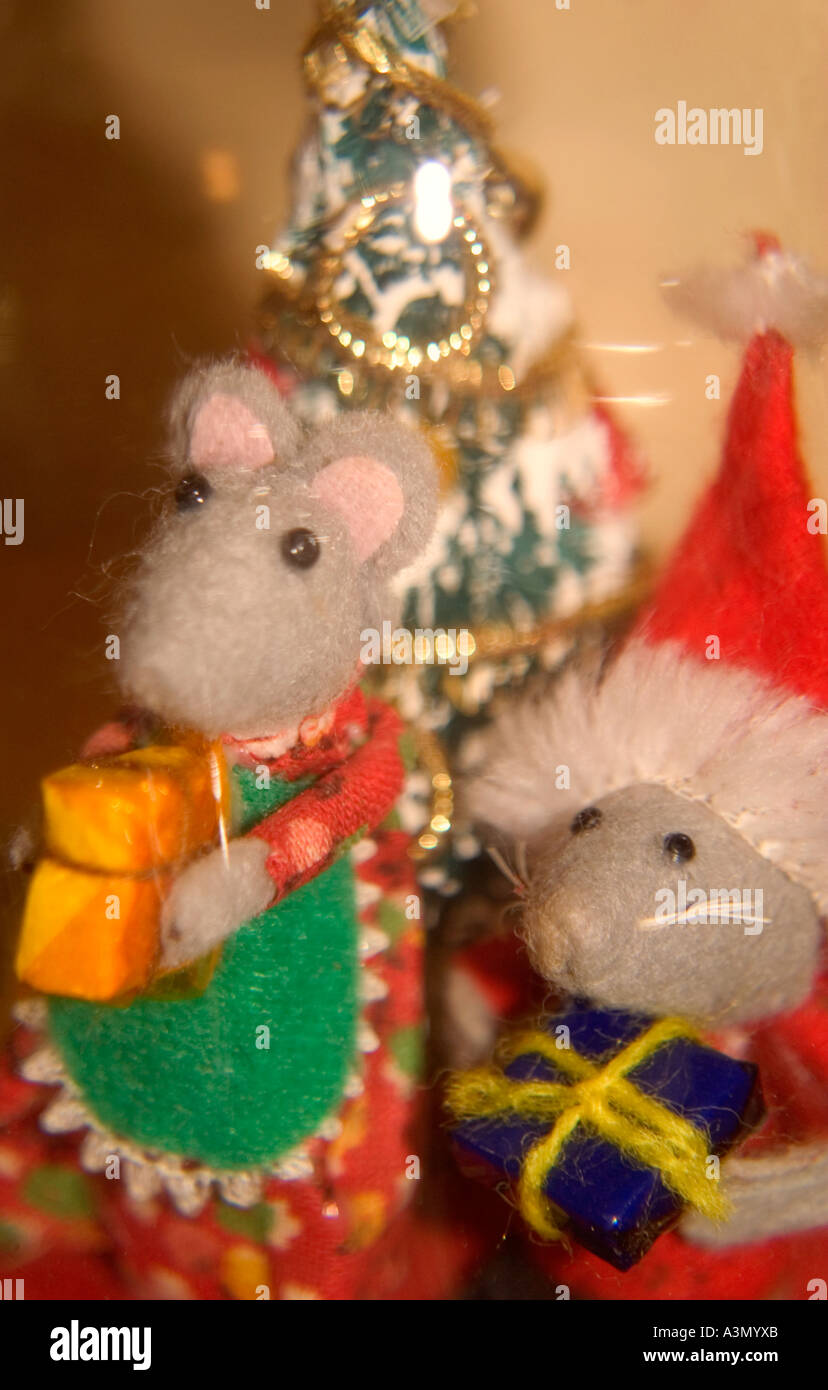 Christmas mice holding presents Stock Photo - Alamy