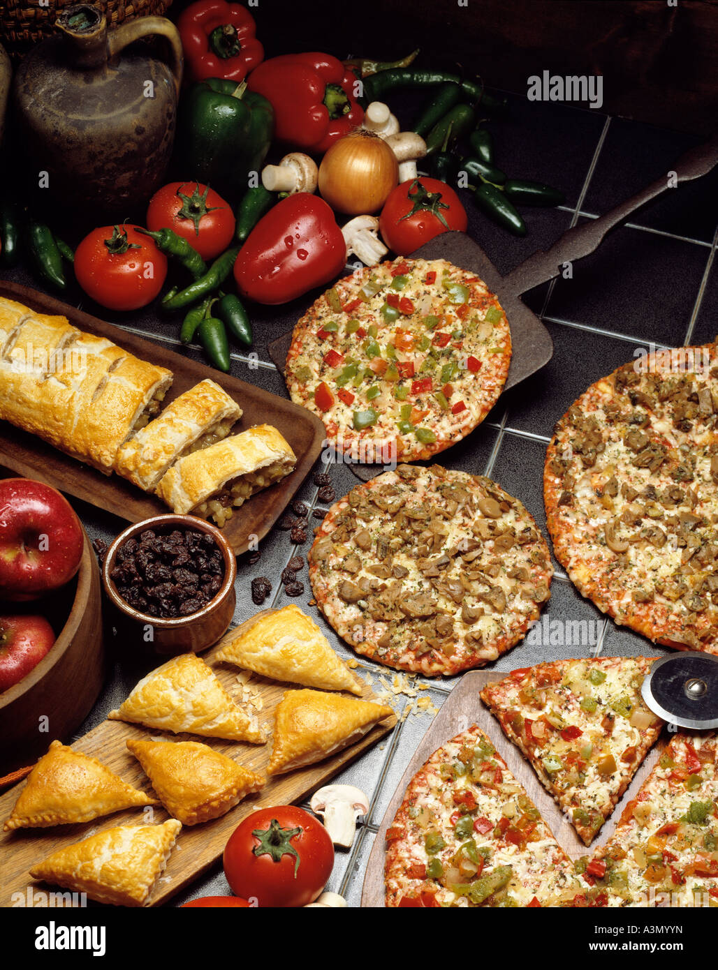 assortment italian food pizza pie slices turnovers sausage cheese ...