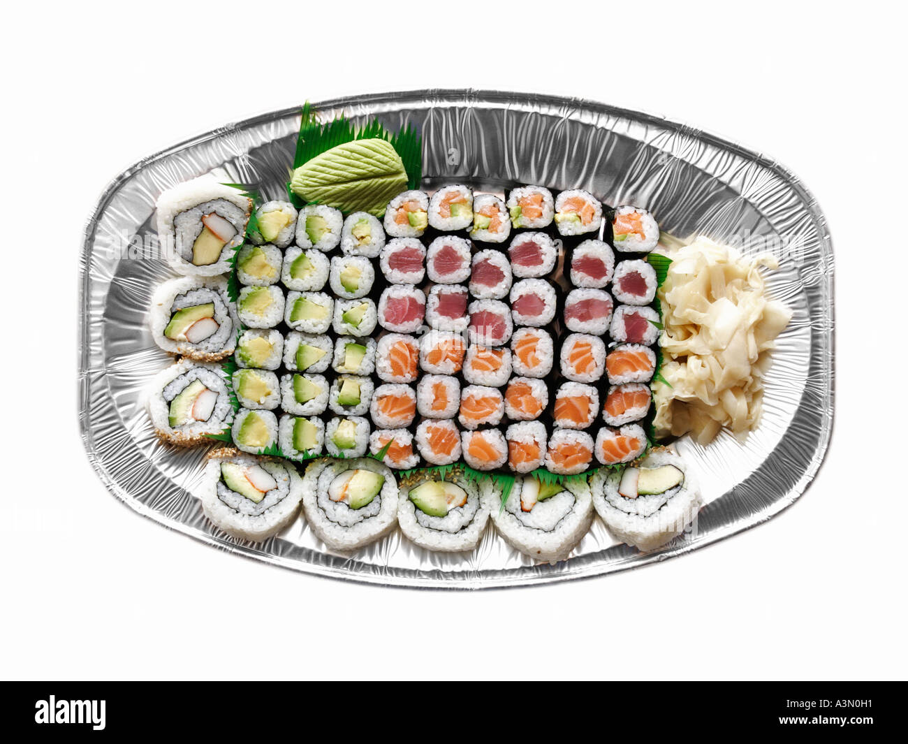 Assortment of maki sushi on silver plate against white background Stock ...