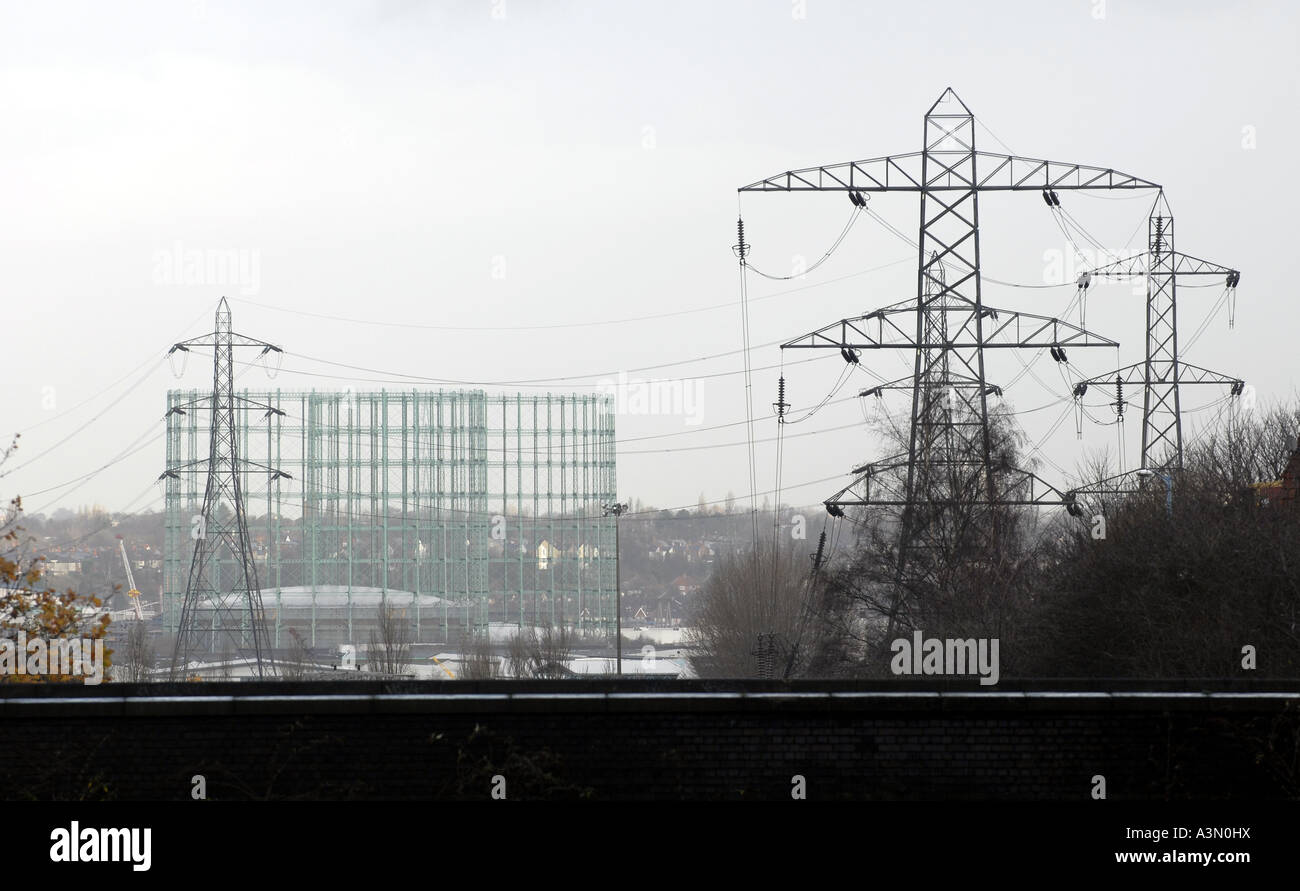 Electricity pylons with gas holders rear across the suburbs of ...