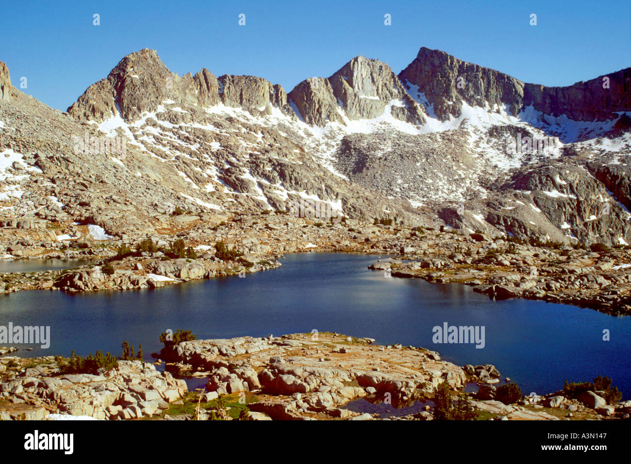 Evening light strikes lower Dusy Basin and the peaks around Knapsack ...