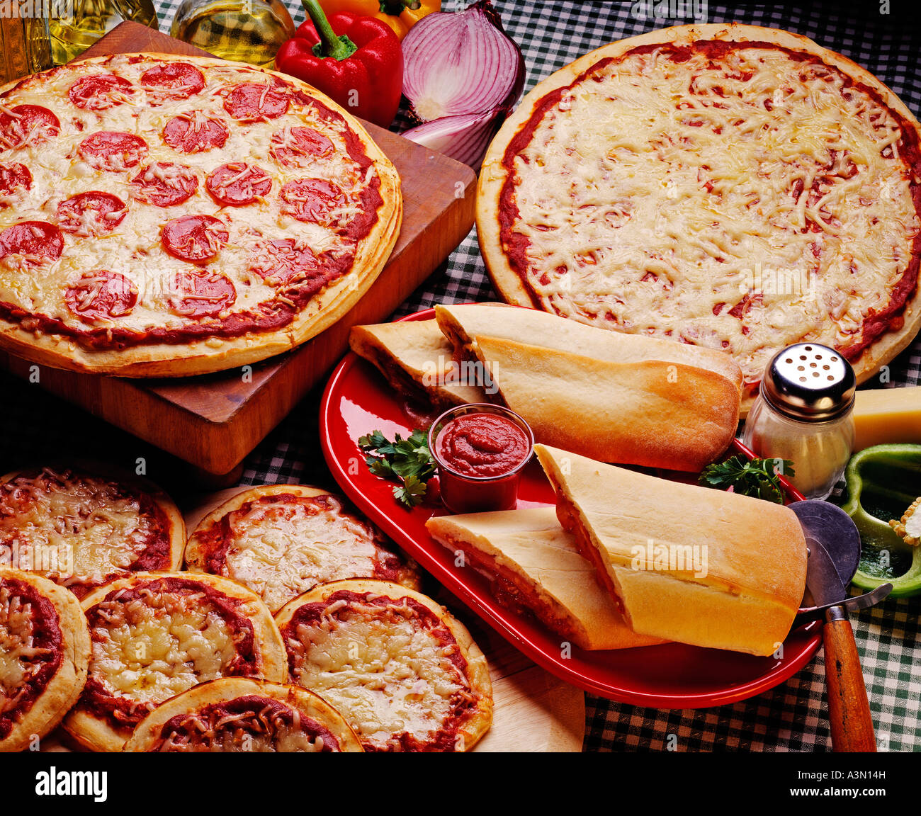 Italian pizza pie Stromboli mini pizzas cheese pepperoni tomato ...