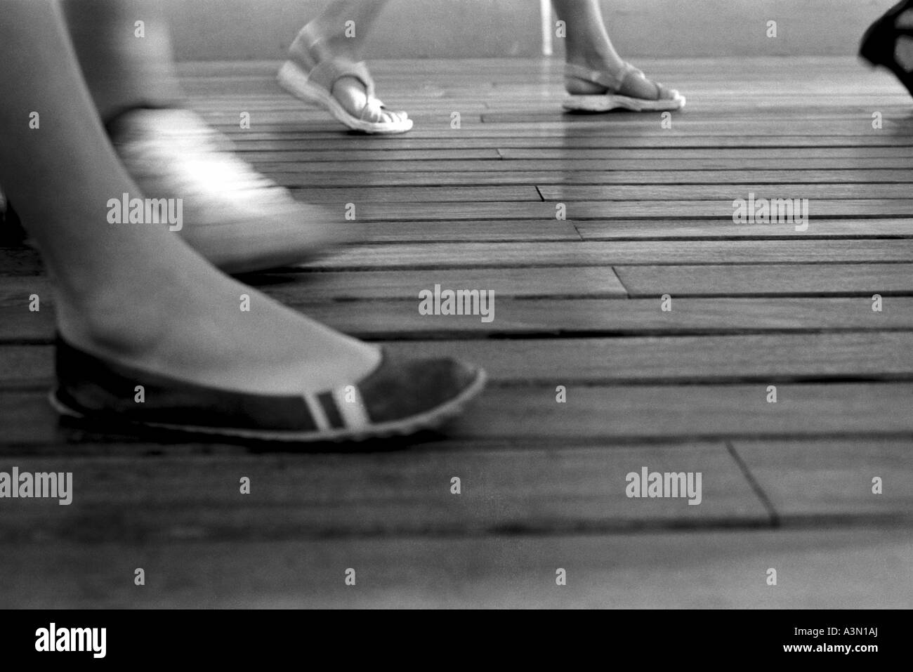 feet of walking people Stock Photo - Alamy