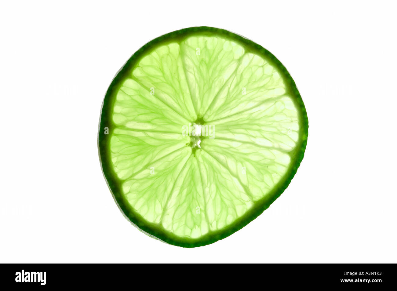 Whole slice lime in Cut Out Stock Images & Pictures - Alamy