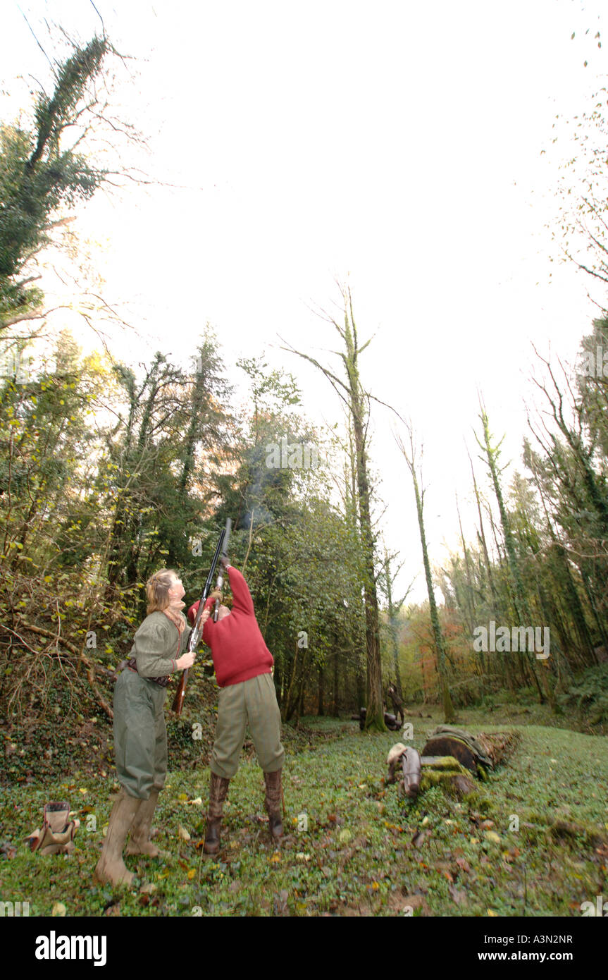 game keeper retrieving birds Stock Photo - Alamy
