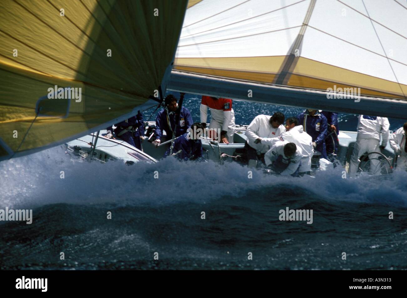 Crew racing on maxi yacht in rough conditions Stock Photo - Alamy