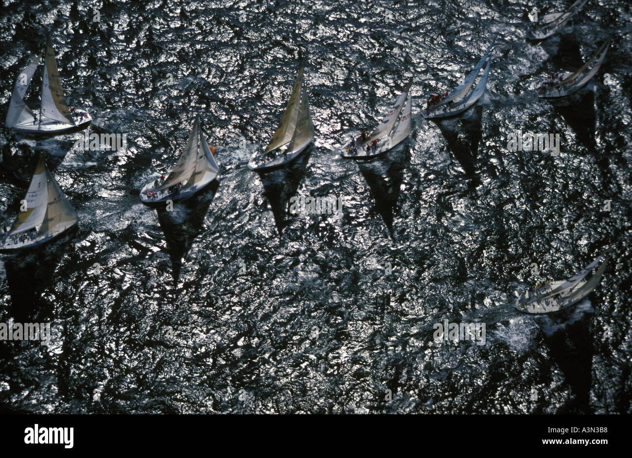 Fleet of racing yachts approach the windward mark Stock Photo - Alamy