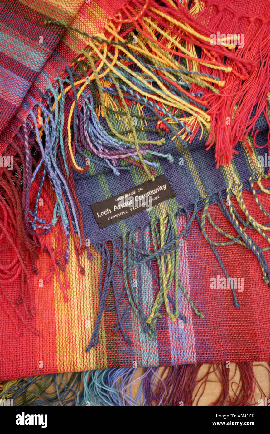 Textiles rainbow dyed coloured threads of wool on the loom at the Loch ...