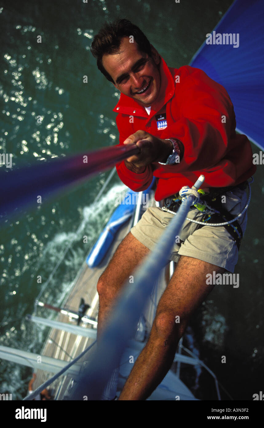Bowman up mast of Swan 51 Formosa Stock Photo - Alamy