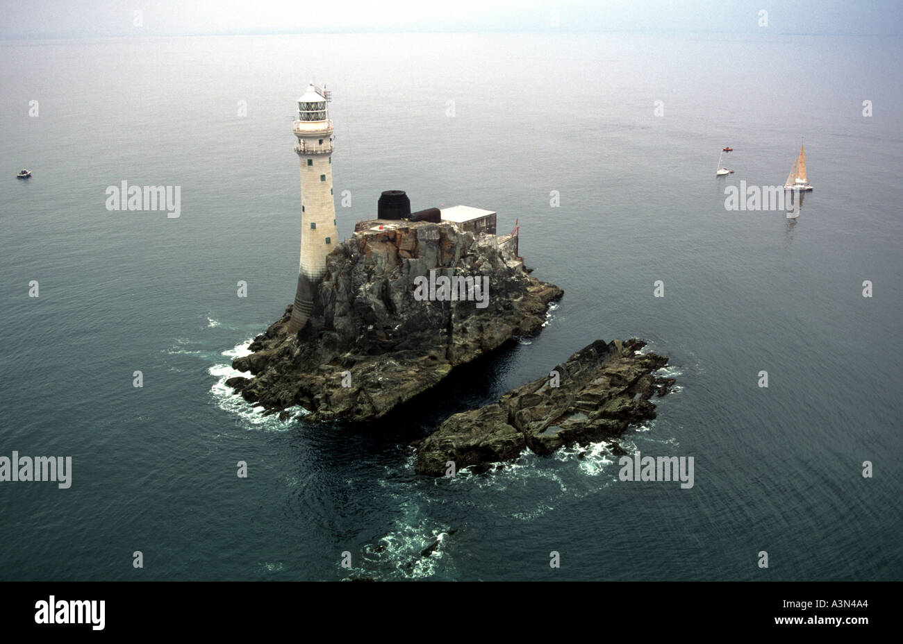 Aerial view of the lighthouse on the Fastnet rock in the Irish Sea ...