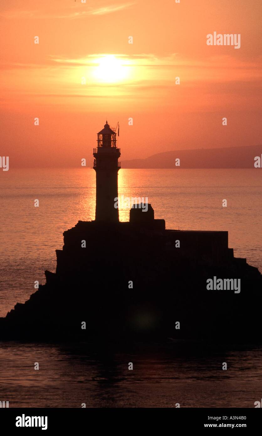 Sunset over the Fastnet lighthouse in the Irish Sea Stock Photo - Alamy