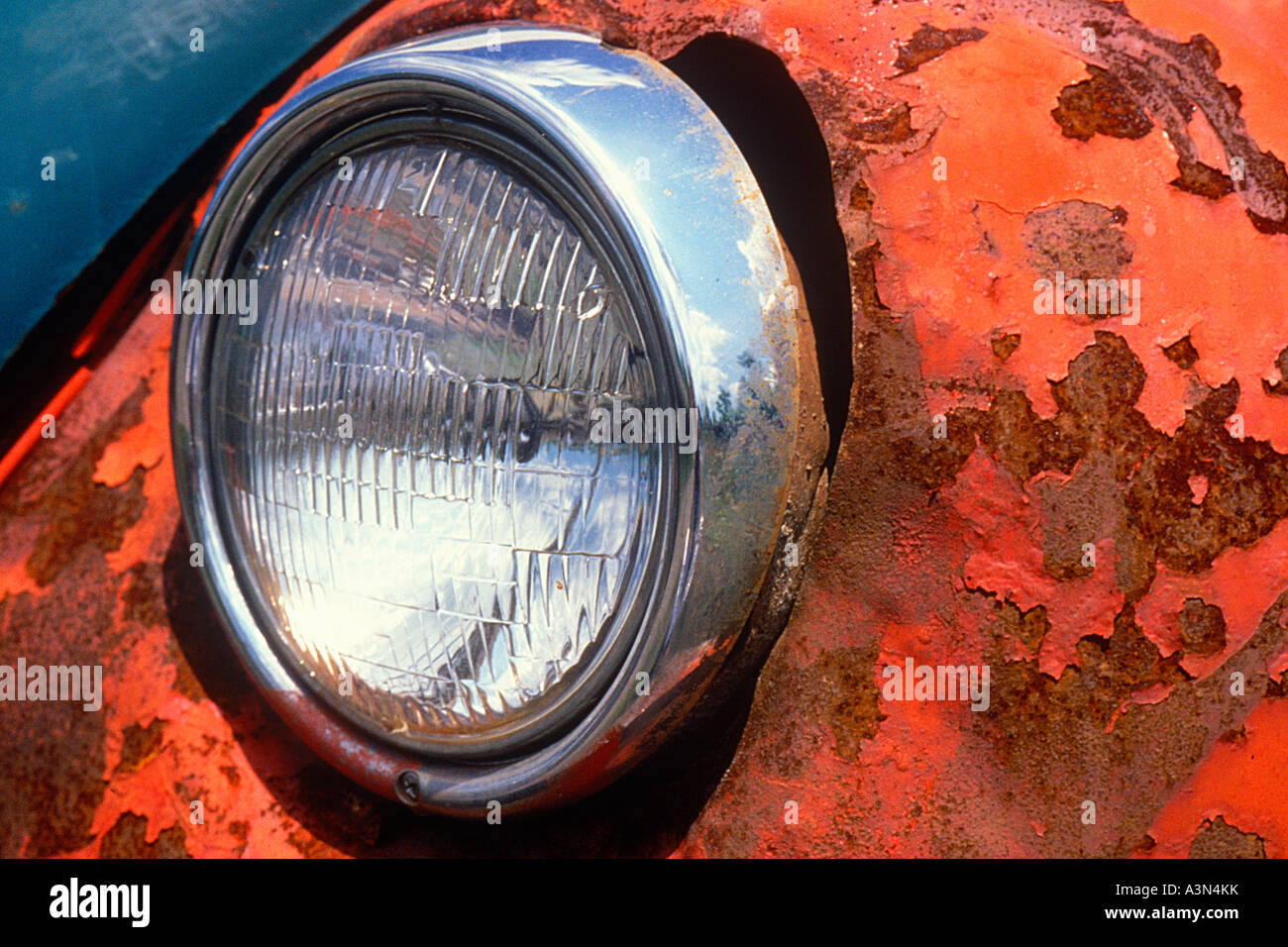 Car. Close up detail of a broken, wrecked decayed discarded headlight ...