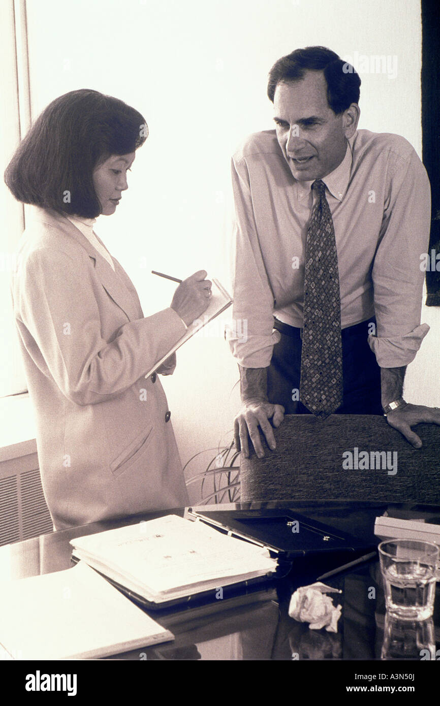 Businessperson in office. Businessman in shirtsleeves dictating to his ...