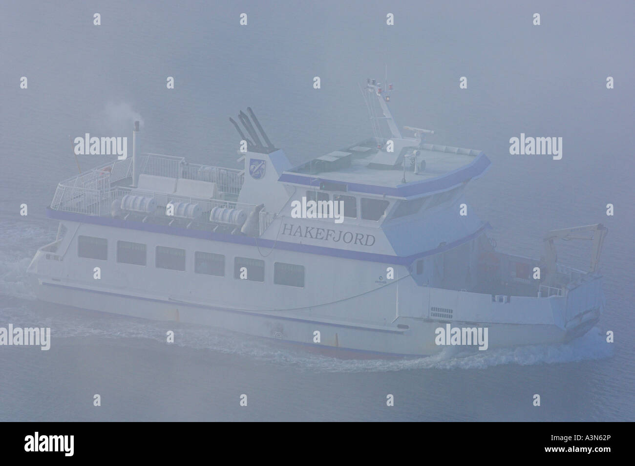 Ferry in mist Stock Photo - Alamy