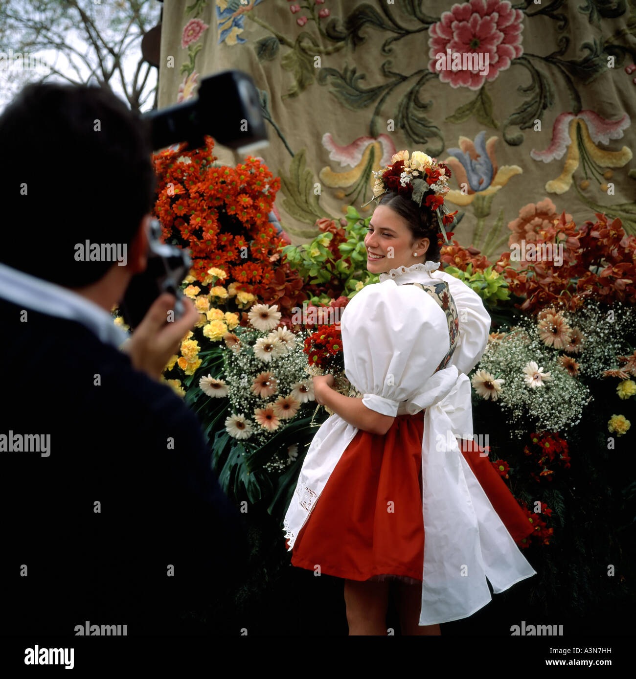 YOUNG WOMAN WITH TRADITIONAL COSTUME POSING FOR THE CAMERA AT SPRING ...