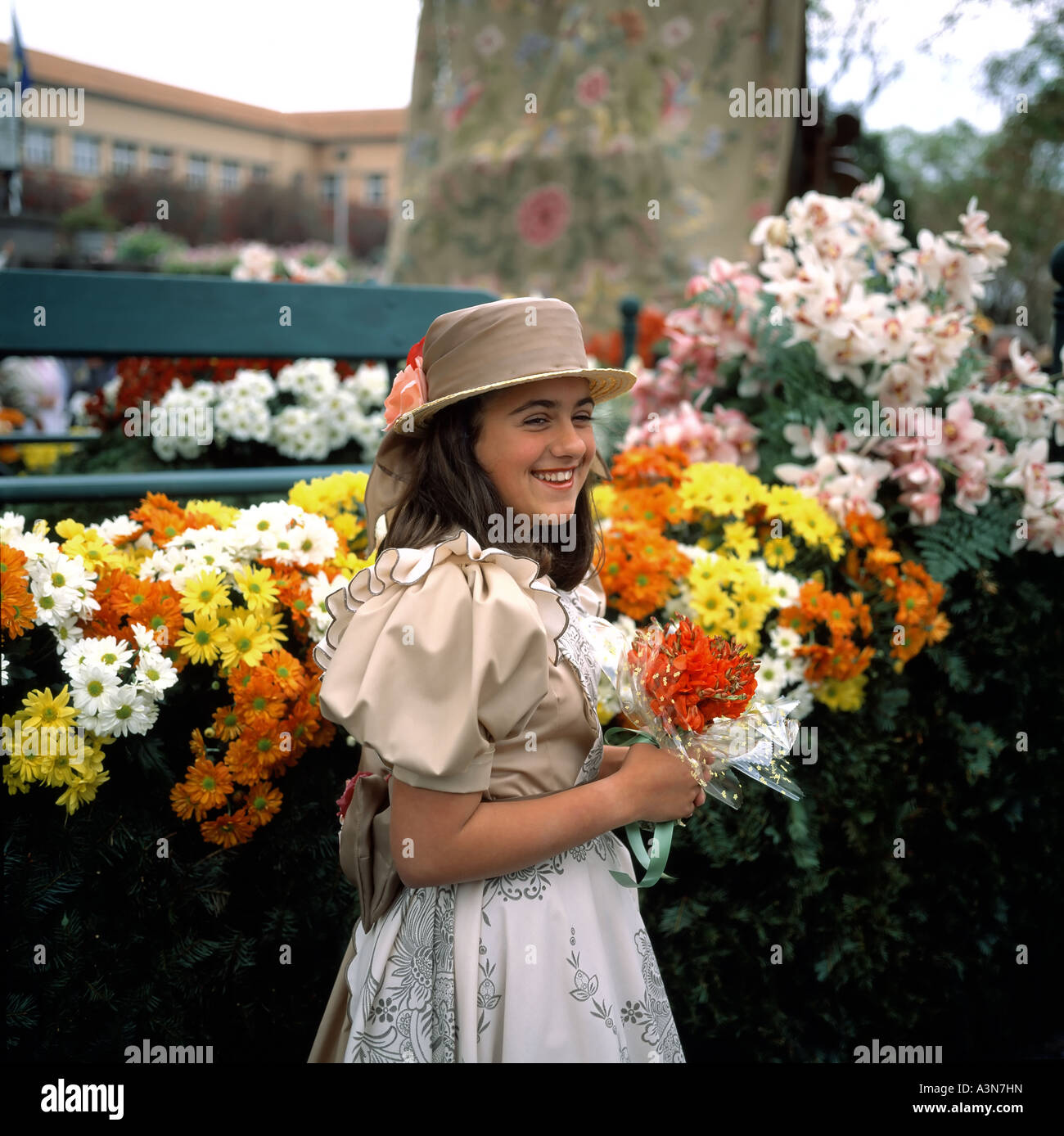 YOUNG WOMAN WITH TRADITIONAL COSTUME AND HAT AT SPRING FLOWER FESTIVAL ...