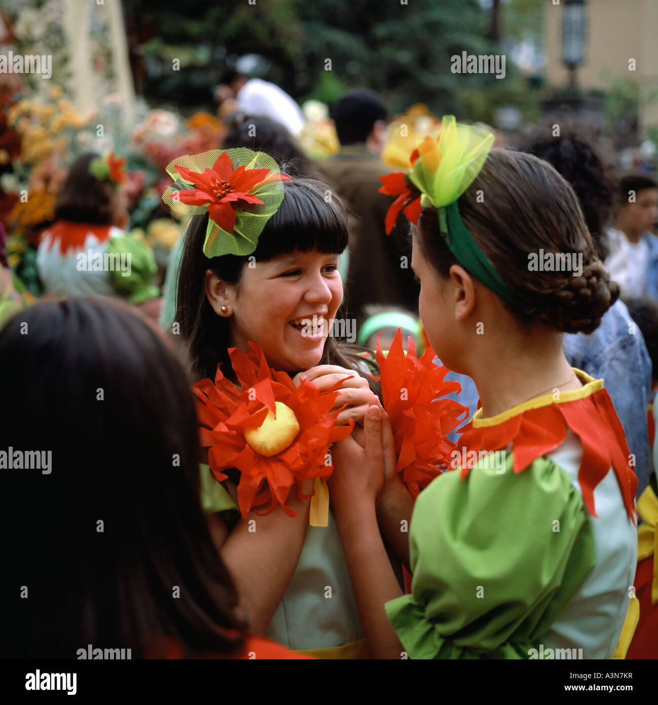 TWO GIRLS WITH GREEN AND RED COSTUME AT SPRING FLOWER FESTIVAL FUNCHAL ...