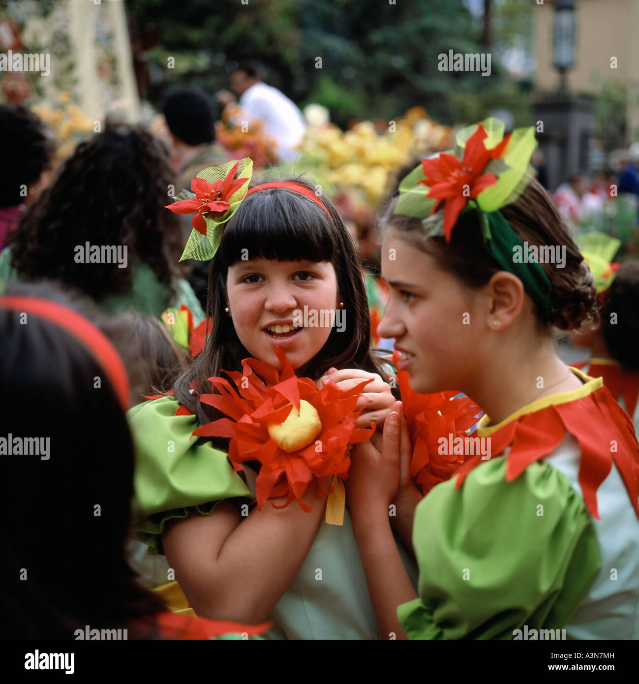 TWO GIRLS WITH GREEN AND RED COSTUME AT SPRING FLOWER FESTIVAL FUNCHAL ...