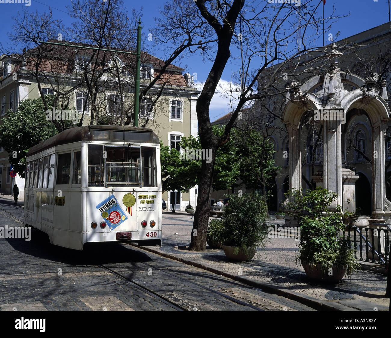 ELECTRICO WHITE TRAM AND FOUNTAIN AT LARGO DO CARMO SQUARE LISBON ...