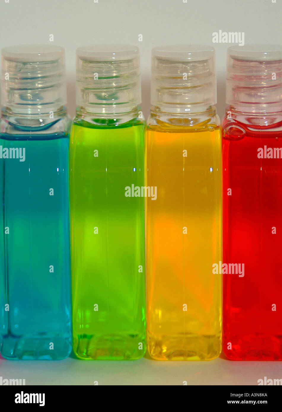 Bottles of multi coloured liquid Stock Photo - Alamy