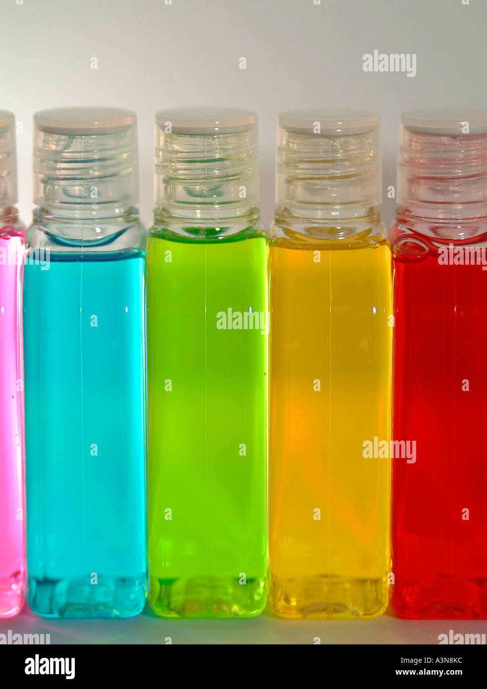 Bottles of multi coloured liquid Stock Photo - Alamy