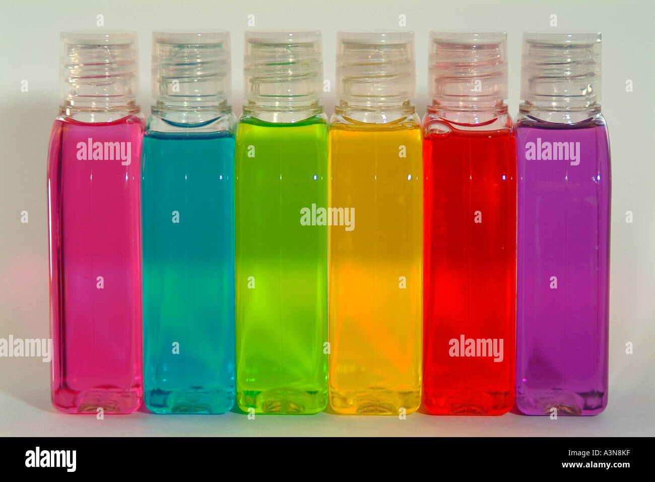 Bottles of multi coloured liquid Stock Photo - Alamy
