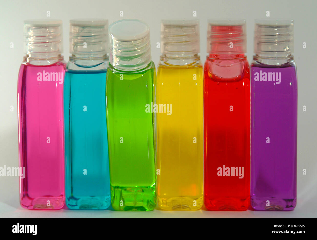 Bottles of multi coloured liquid Stock Photo - Alamy