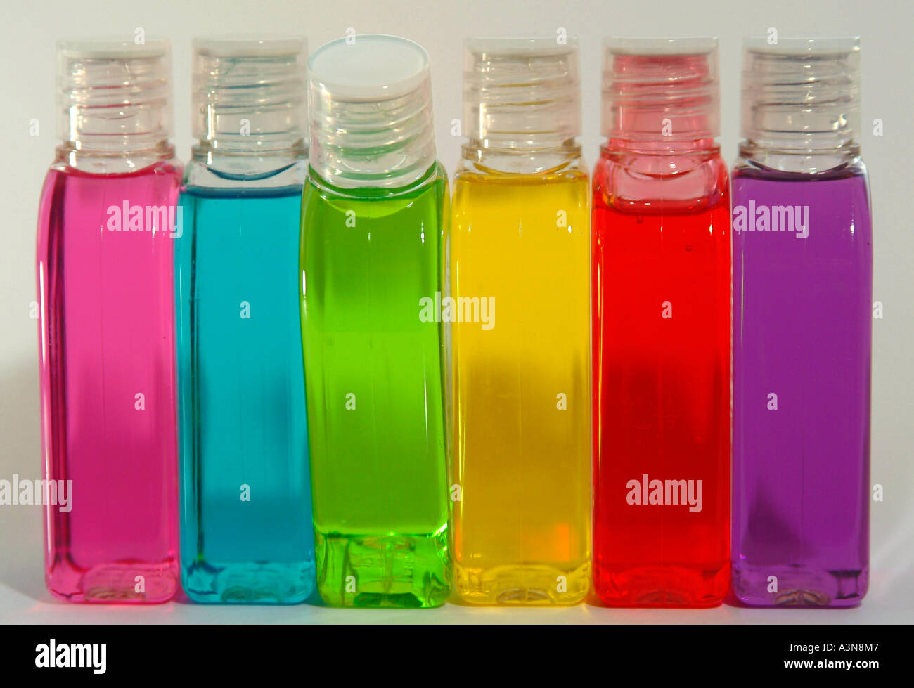 Bottles of multi coloured liquid Stock Photo - Alamy