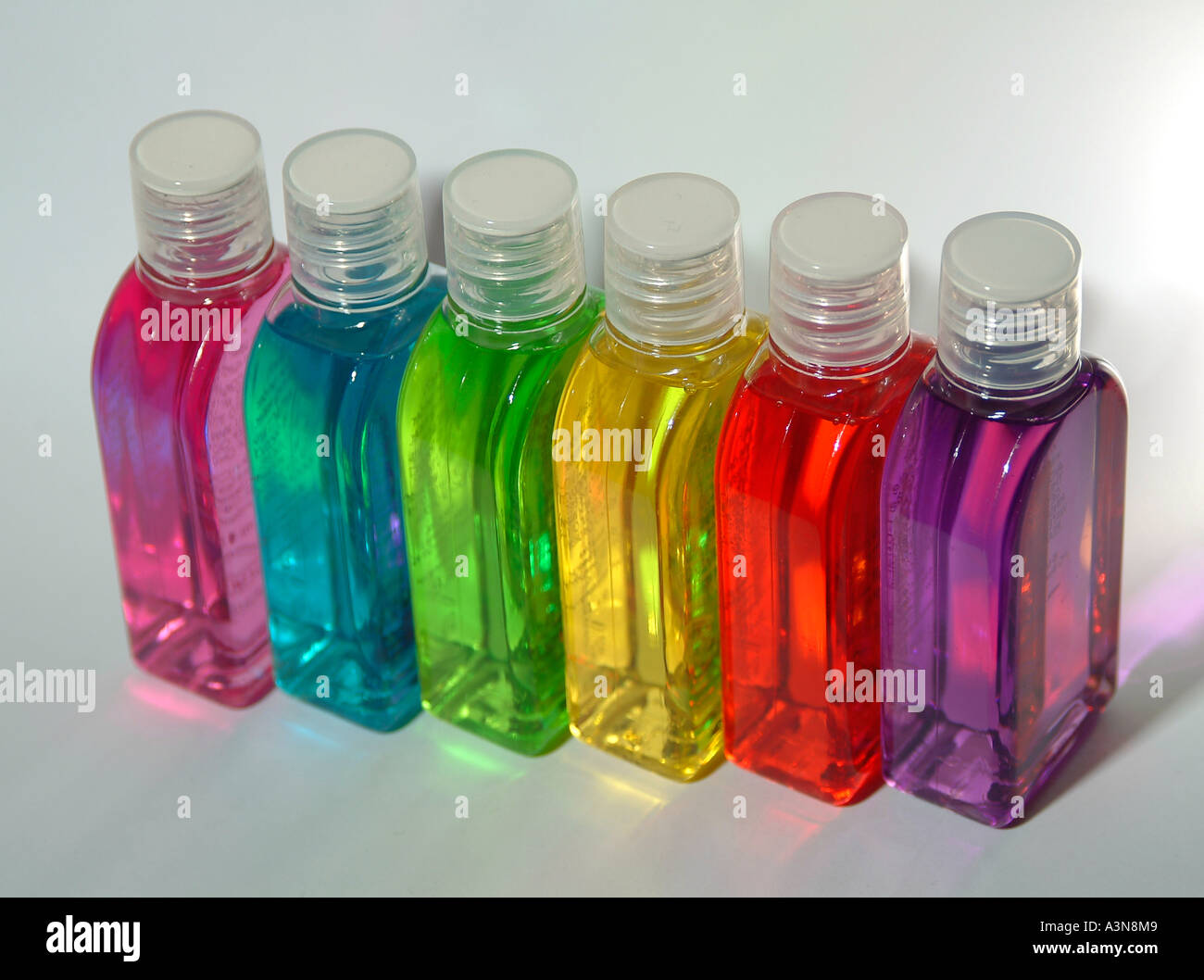 Bottles of multi coloured liquid Stock Photo - Alamy