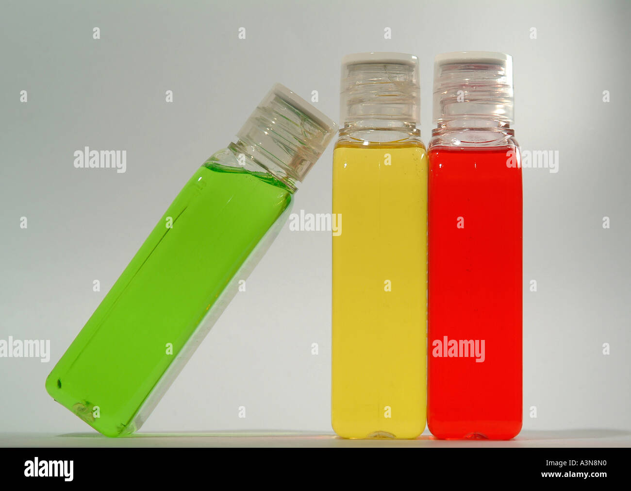 Bottles of multi coloured liquid Stock Photo - Alamy